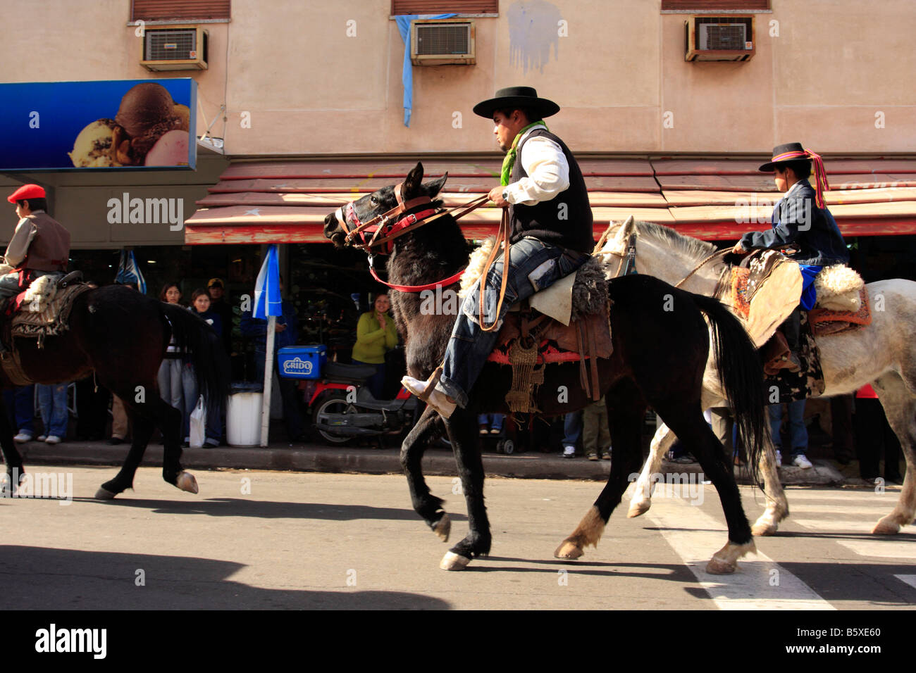 Gauchos riding horses hi-res stock photography and images - Alamy