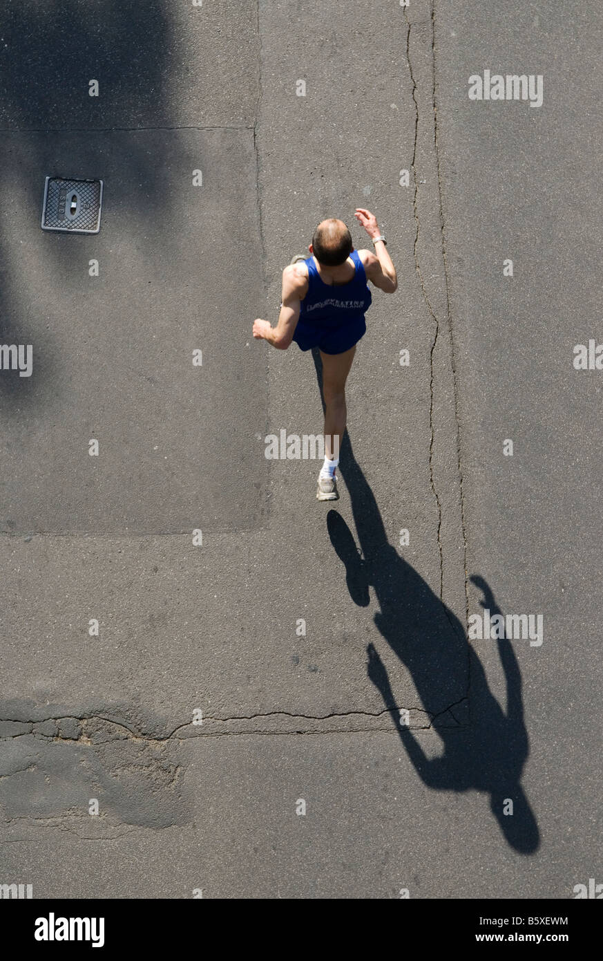 Marathon Runner seen from above Stock Photo - Alamy