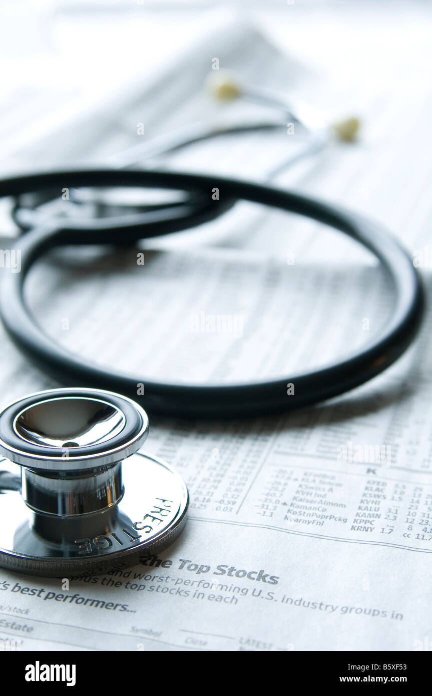 Doctor's stethoscope on business paper Stock Photo - Alamy