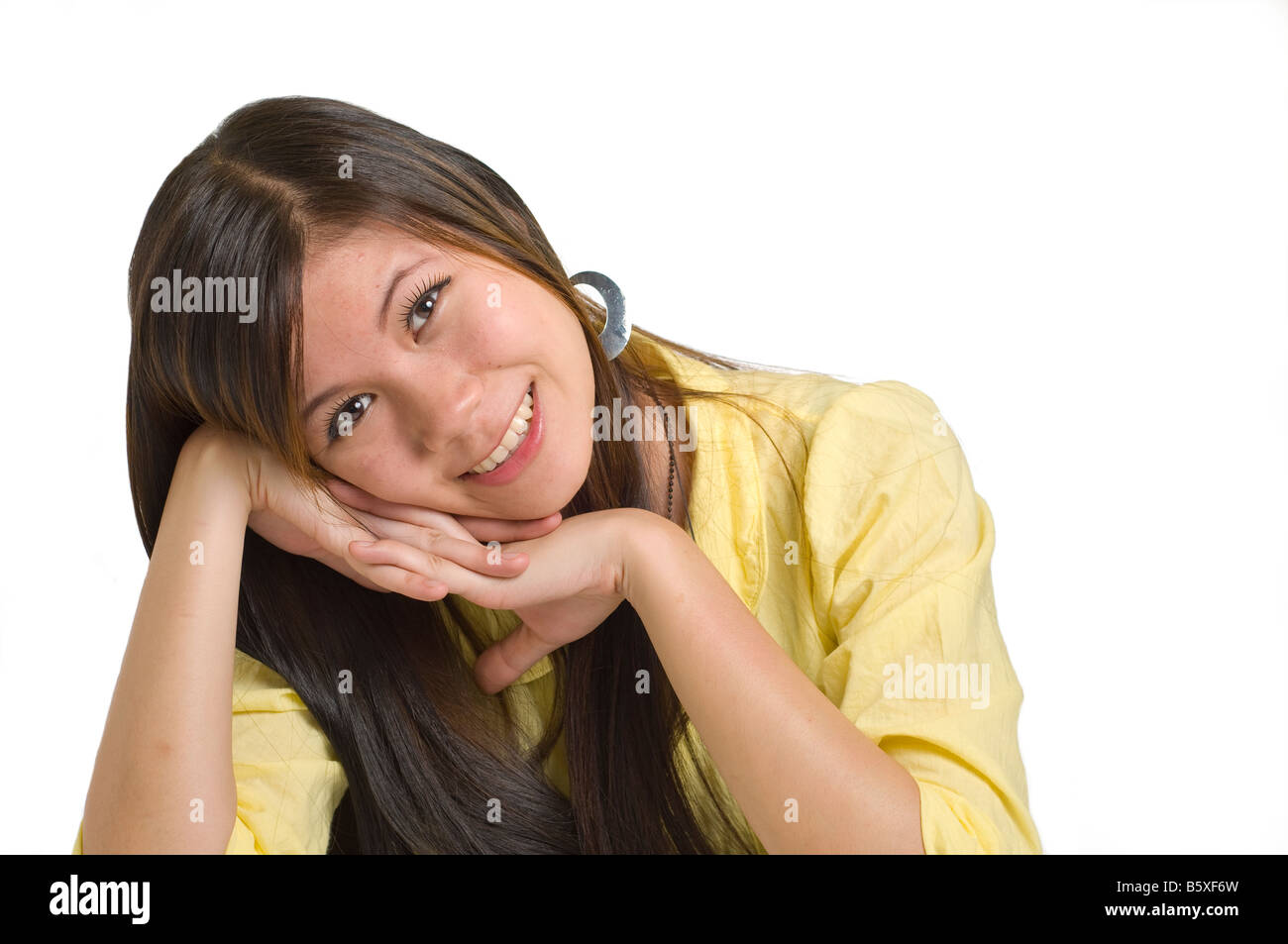 Modern looking Asian woman resting her head on her hand and looking at camera Stock Photo - Alamy