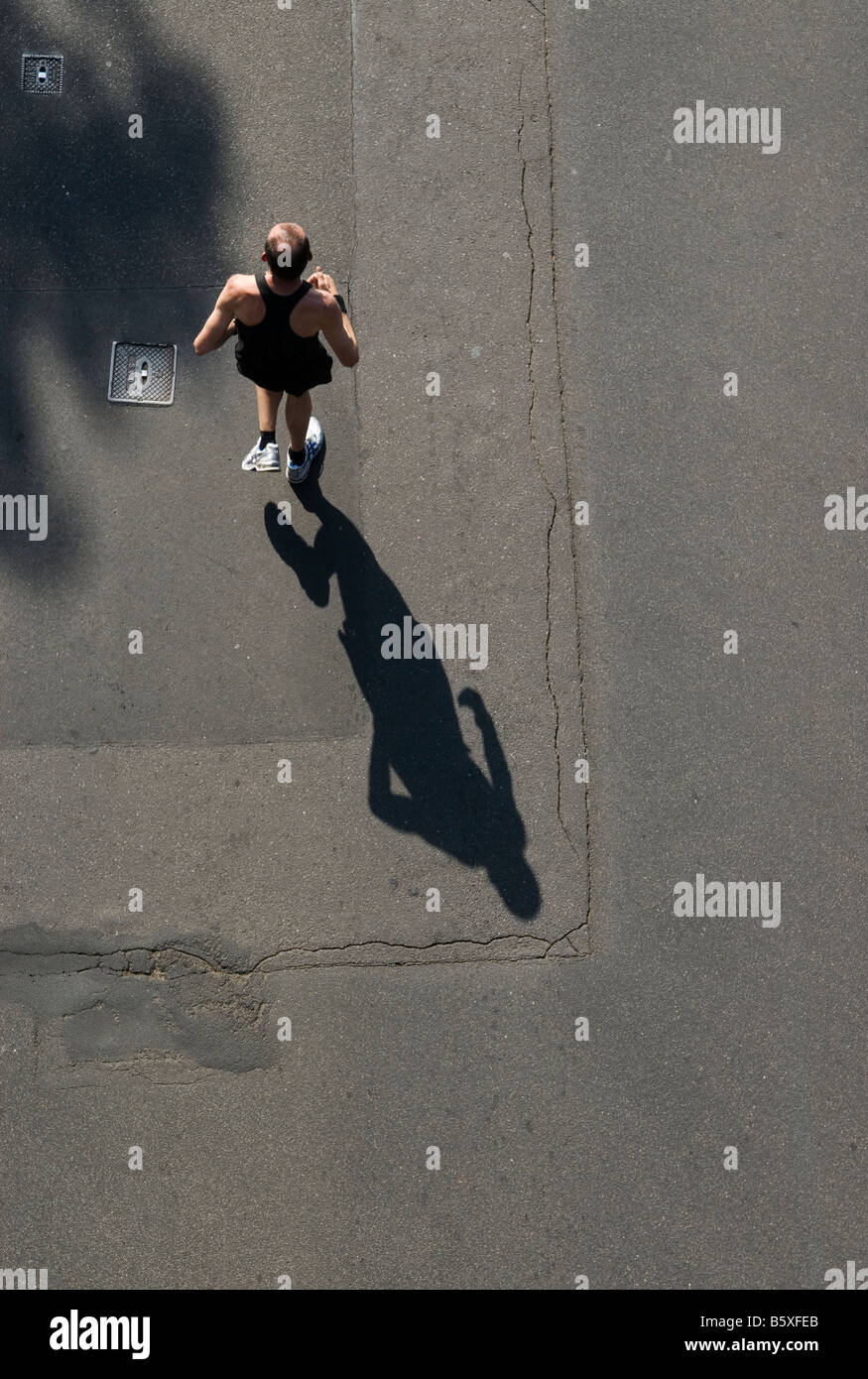Marathon Runner seen from above Stock Photo - Alamy