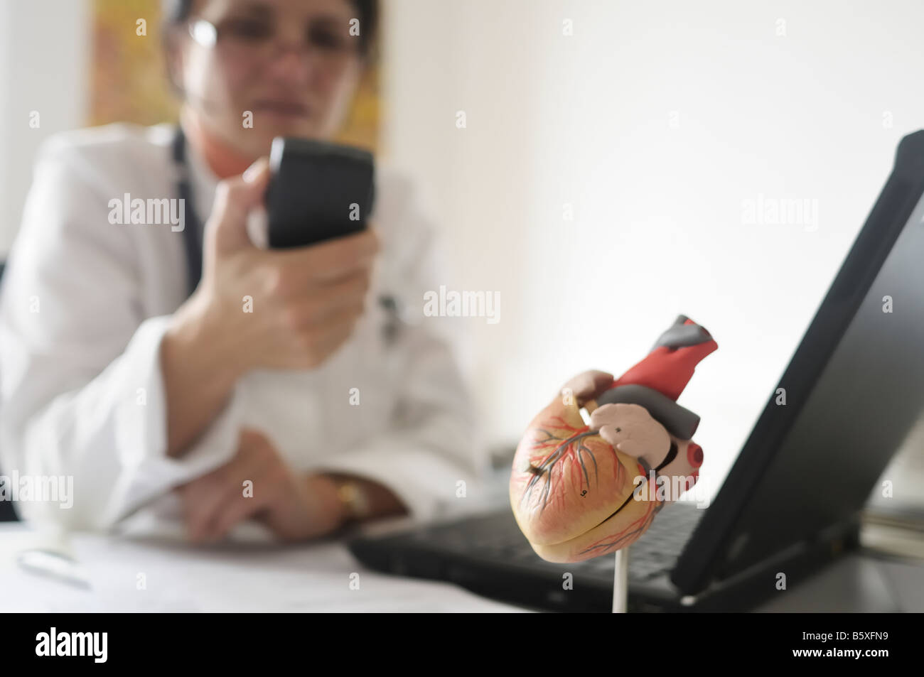 Doctor using a voice tape recorder Stock Photo - Alamy