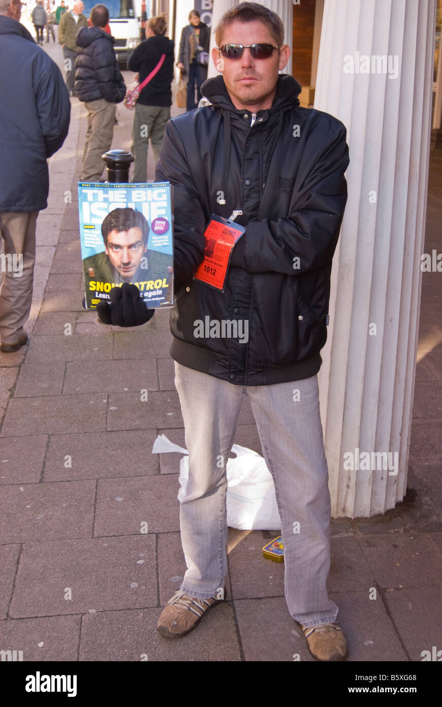 Man selling The Big Issue magazine for homeless people in Woodbridge ...