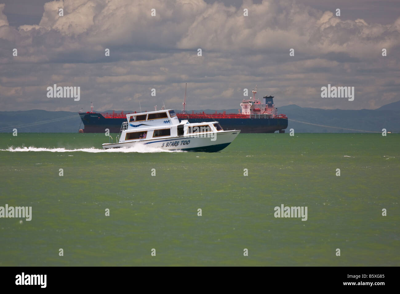 BELIZE CITY BELIZE Tour boat passes oil tanker on way into Belize ...