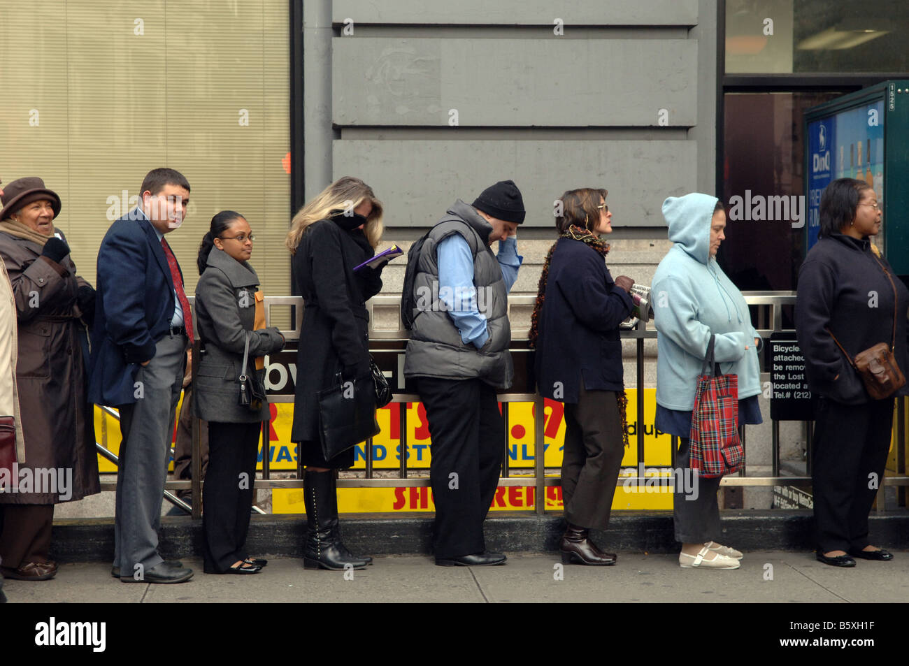Hundreds of people line up in New York at a job fair sponsored by the ...