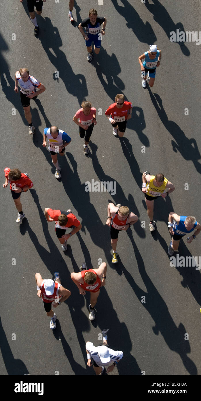 Marathon Runners seen from above Stock Photo - Alamy