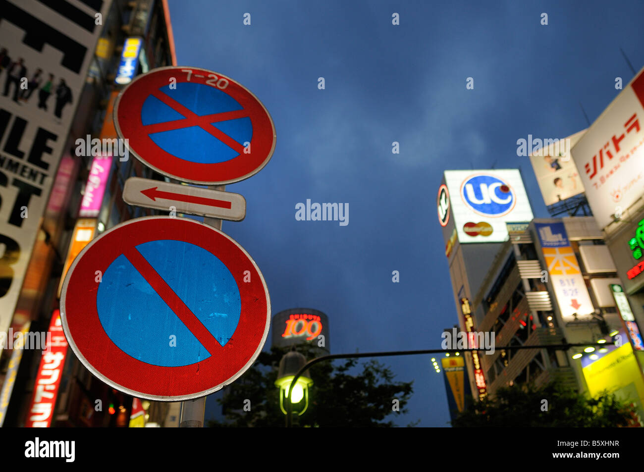 Traffic sign and Shibuya 109 building (popular fashion stores for young ...