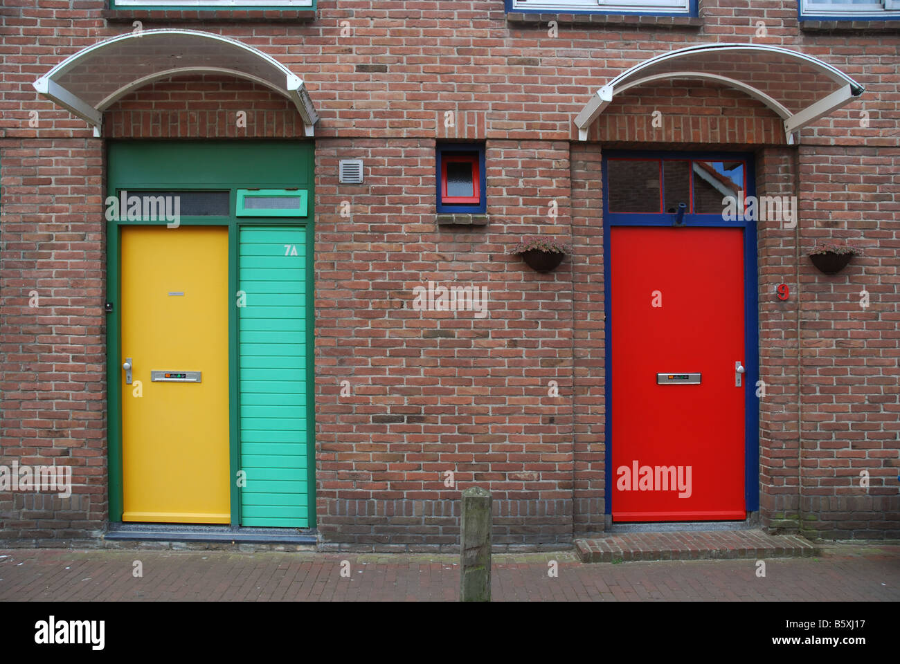 Two front doors and street hi-res stock photography and images - Alamy