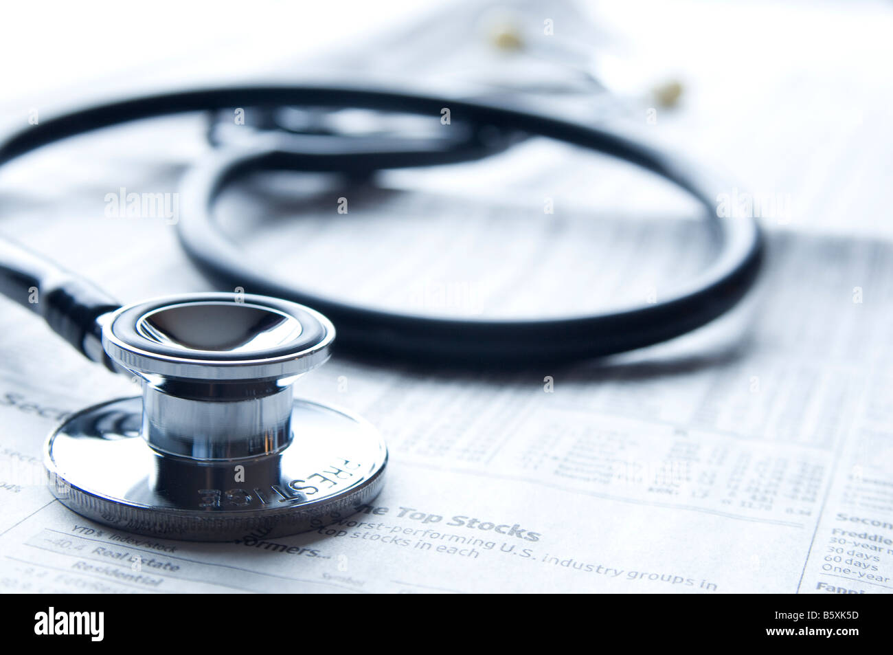 Doctor's stethoscope on business paper Stock Photo - Alamy