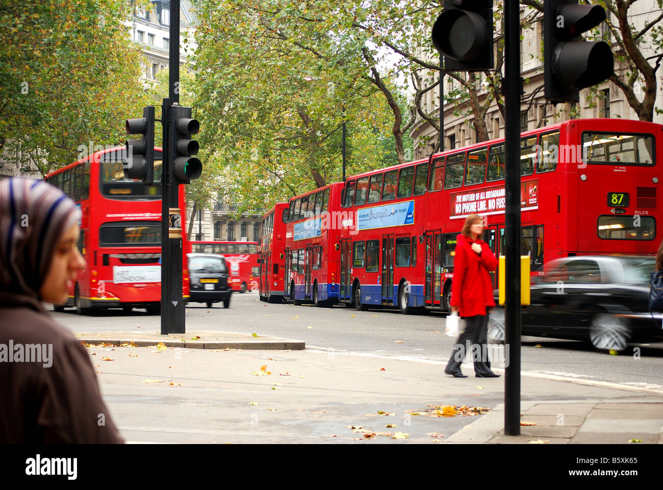 Big red buses hi-res stock photography and images - Alamy