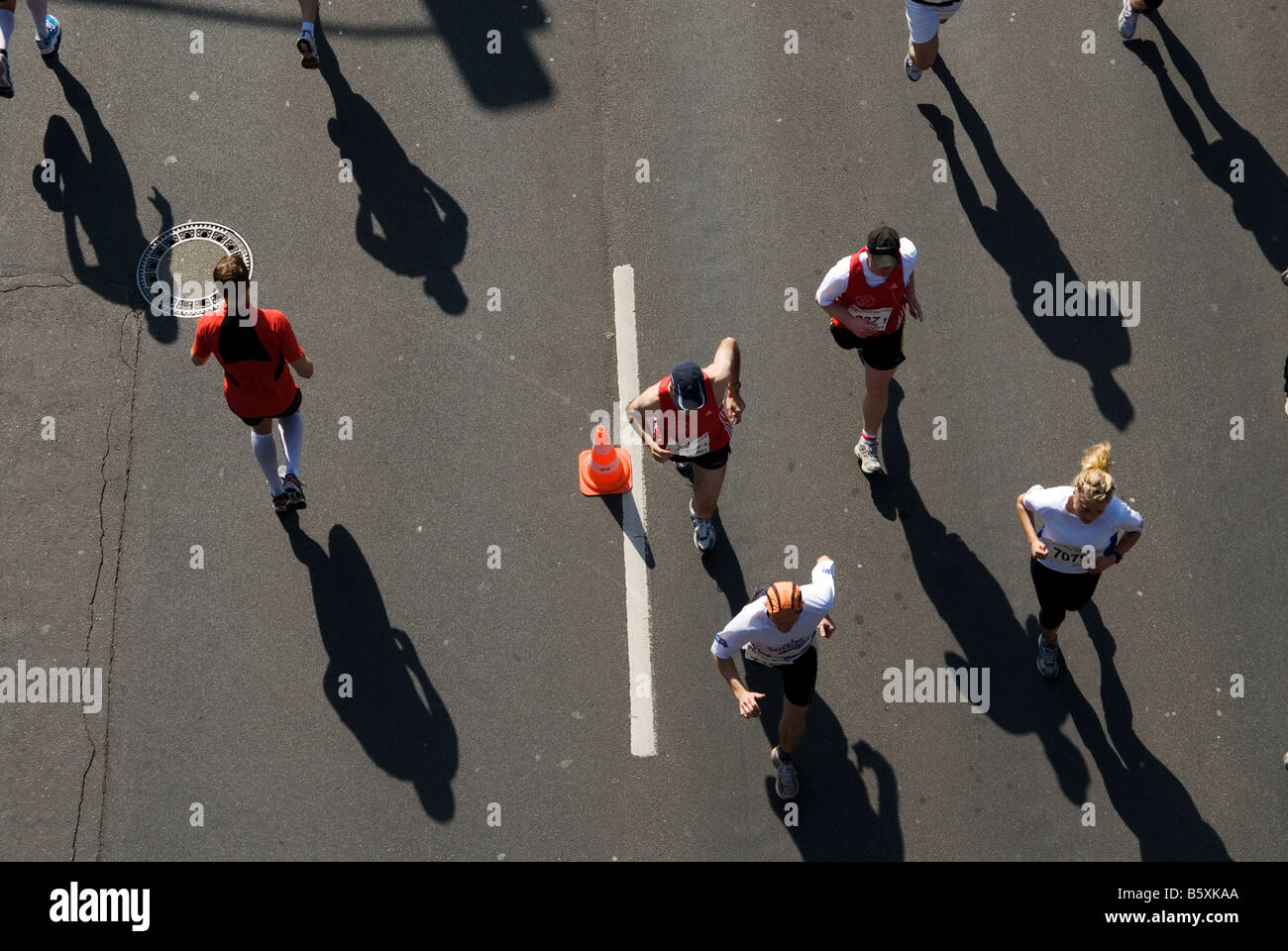 Marathon Runners seen from above Stock Photo - Alamy
