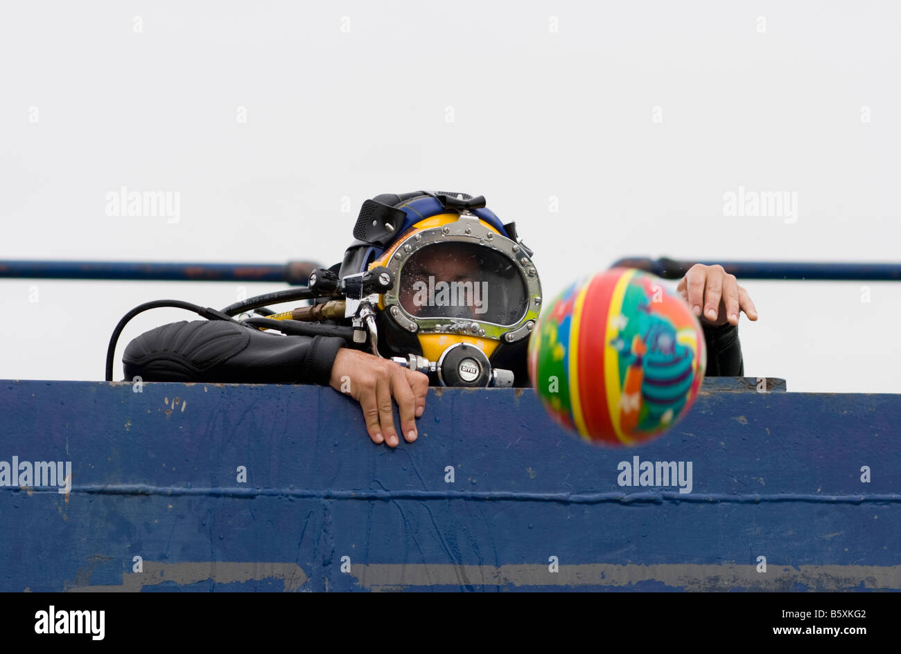 Royal Navy diver with beach ball Stock Photo - Alamy