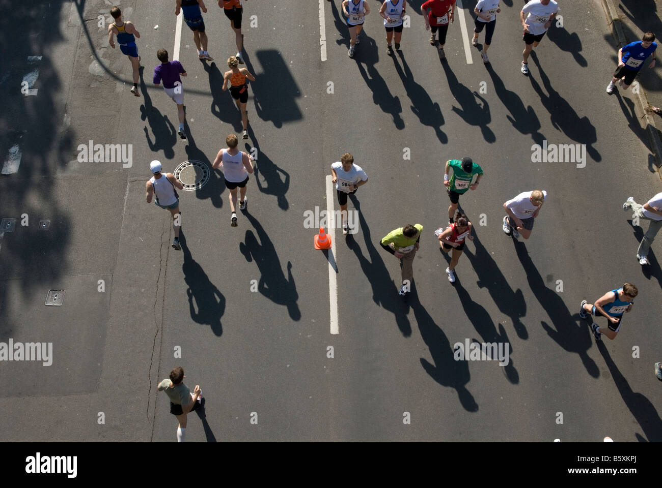 Marathon Runners seen from above Stock Photo - Alamy