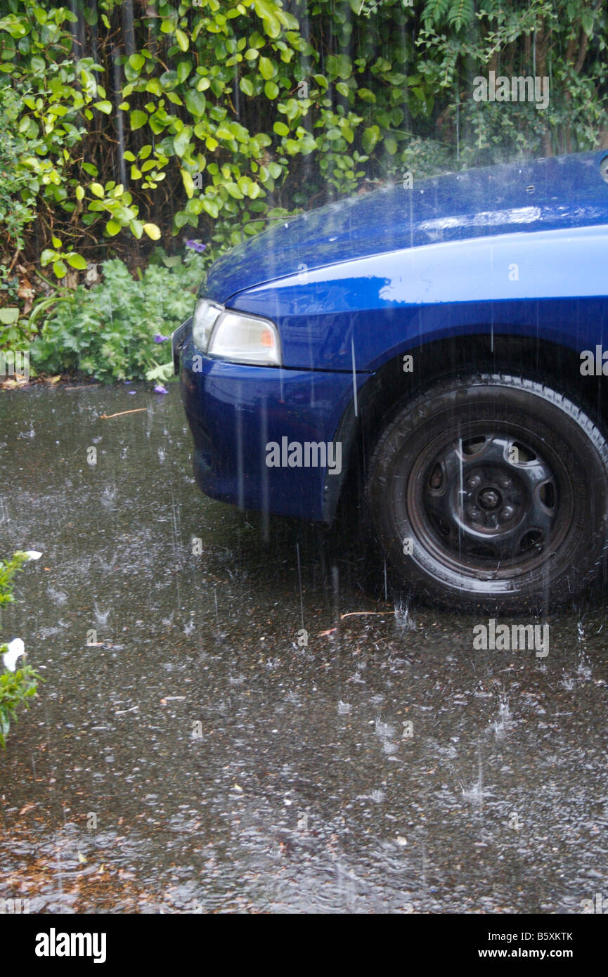 Heavy rain outside a house in Ireland flooding in the driveway Stock ...