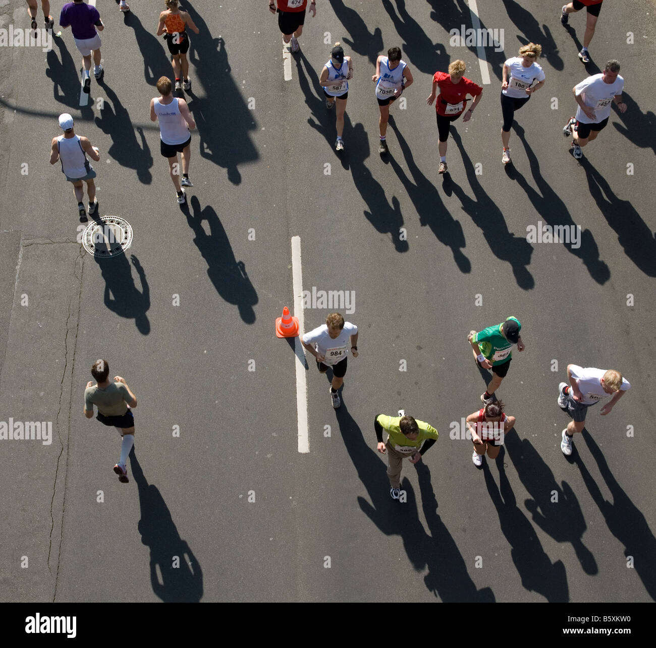 Marathon Runners seen from above Stock Photo - Alamy