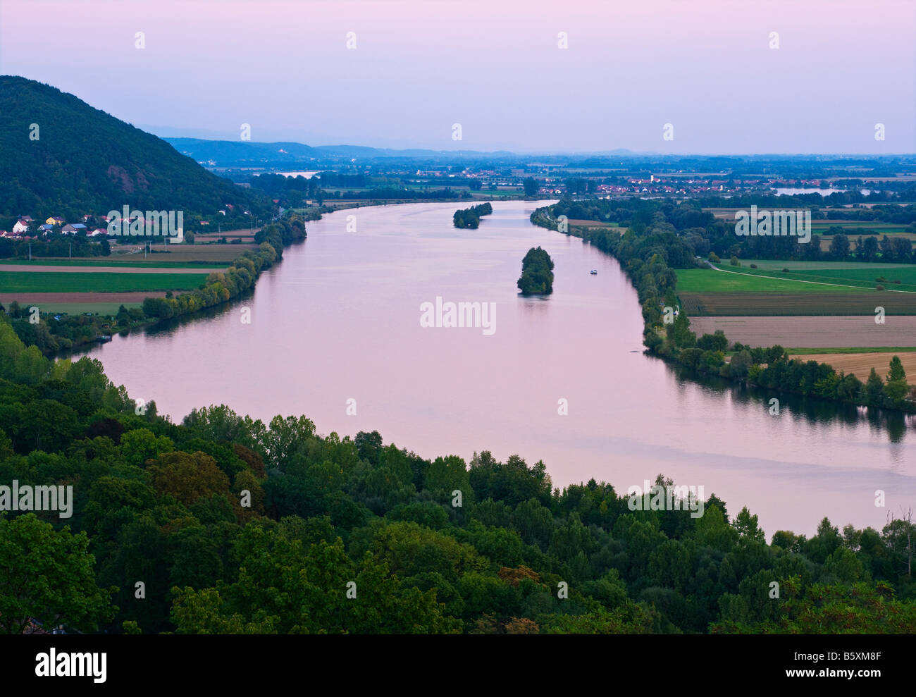 View east as Danube river passes near the village of Donaustauf ...