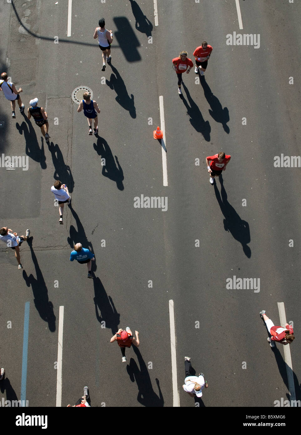 Marathon Runners seen from above Stock Photo - Alamy