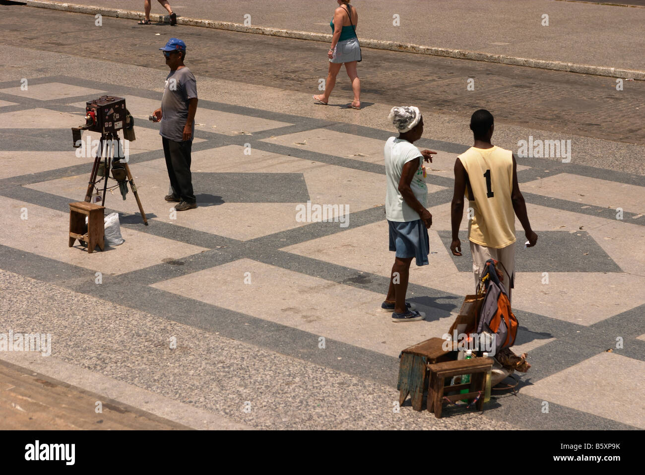 Cuban photographers with their classic cameras outside the Capitolio ...