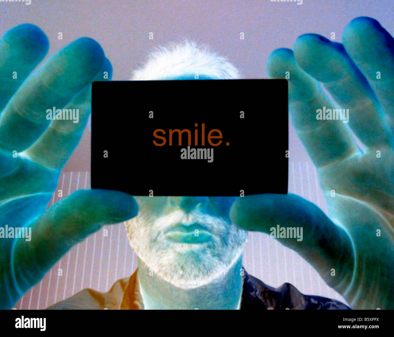 Hands holding smile sign Stock Photo - Alamy
