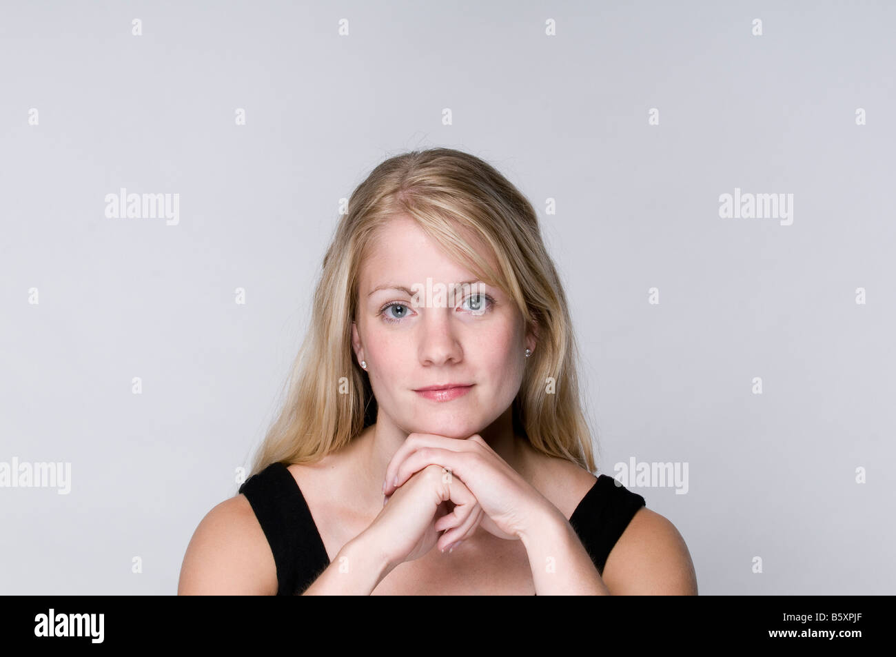 Stern face woman hi-res stock photography and images - Alamy