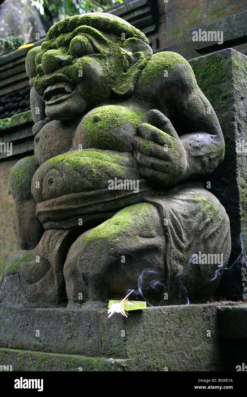 Stone statue covered with moss, Monkey Forest, Ubud, Bali, Indonesia ...