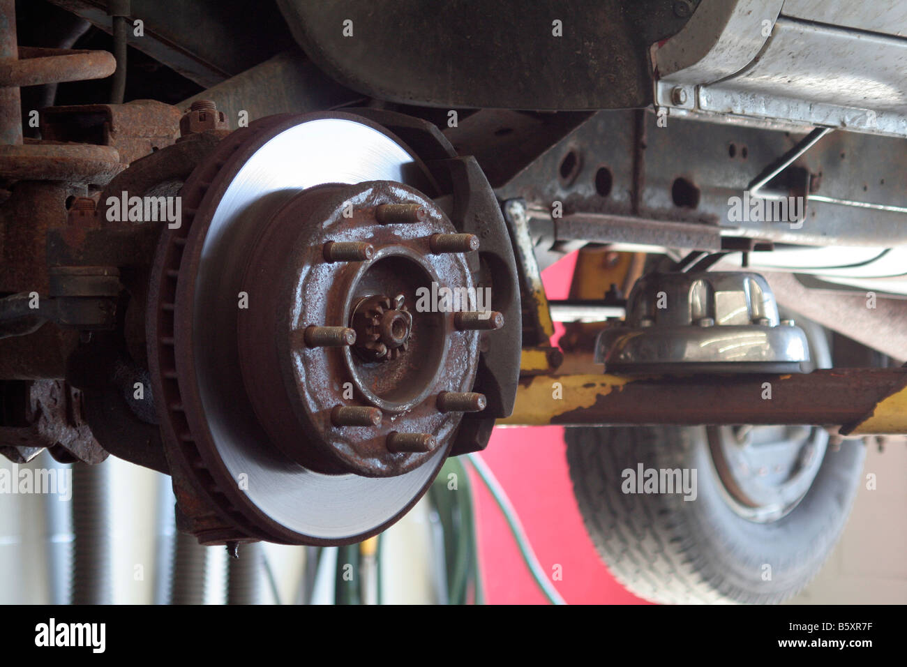 Auto service shop disk brakes Stock Photo - Alamy