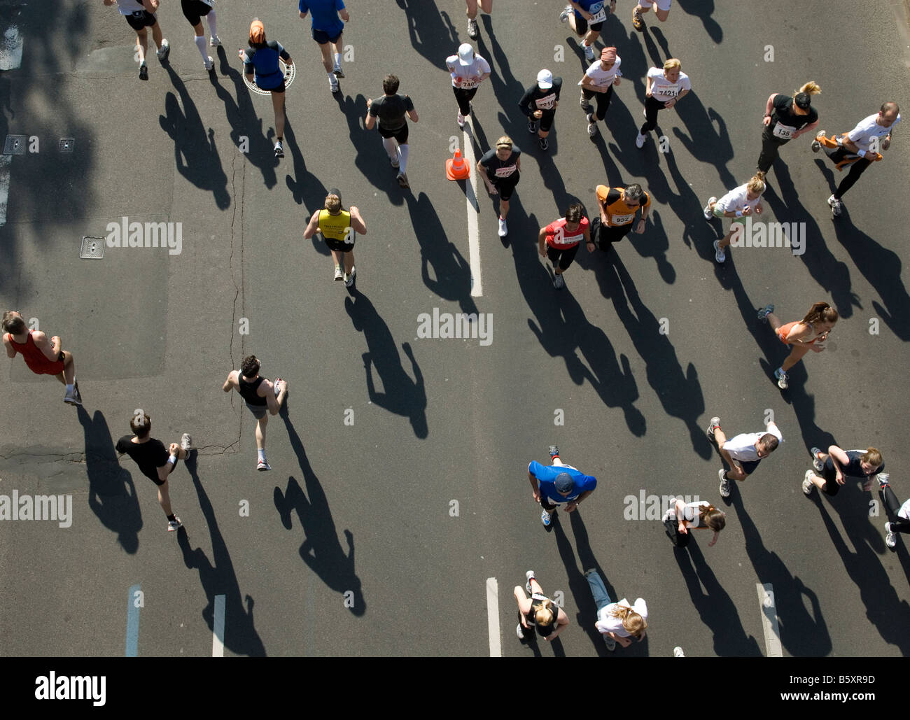 Marathon Runners seen from above Stock Photo - Alamy