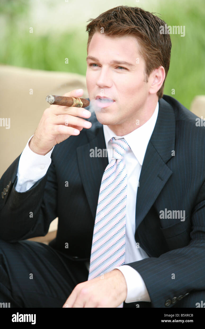 Suit and cigar hi-res stock photography and images - Alamy