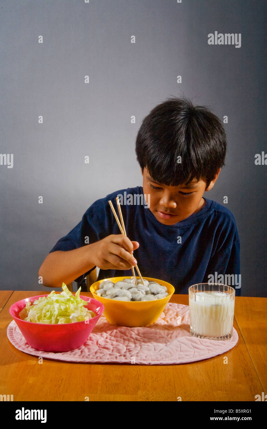 Asian eating rice High Resolution Stock Photography and Images - Alamy