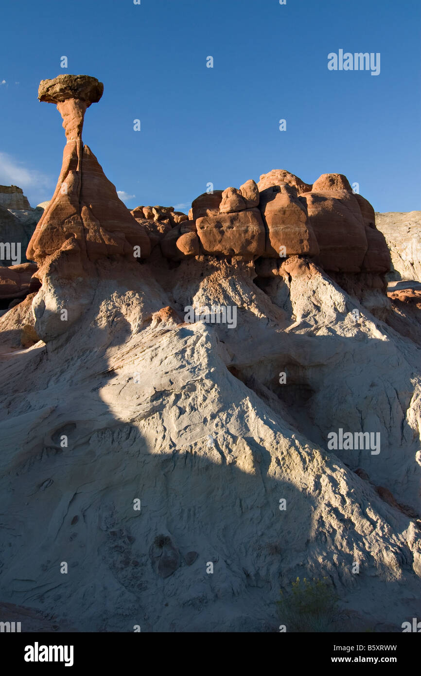 Sunset illuminates the toadstool hoodoos of Escalante National Monument ...