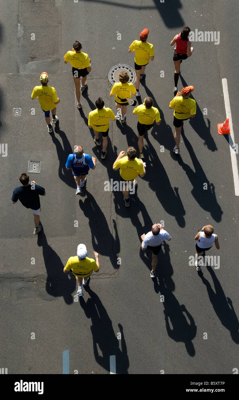 Marathon Runners seen from above Stock Photo - Alamy