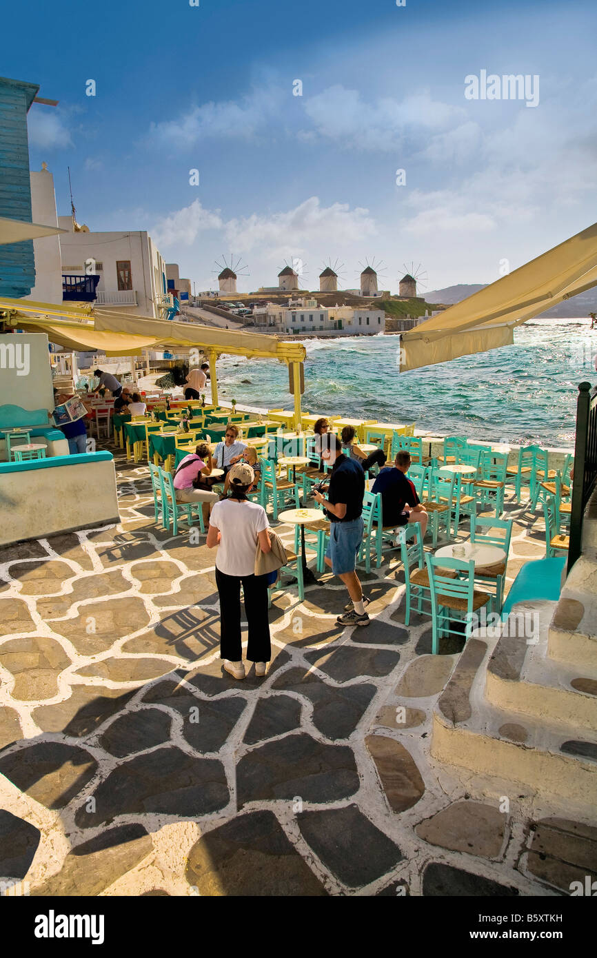 People on stone sidewalk in Mykonos, Greece Stock Photo - Alamy