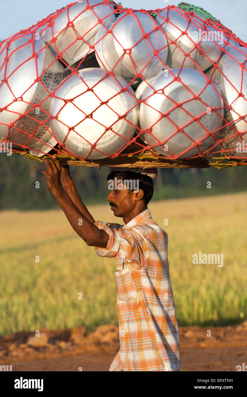 Indian man balancing heavy load hi-res stock photography and images - Alamy
