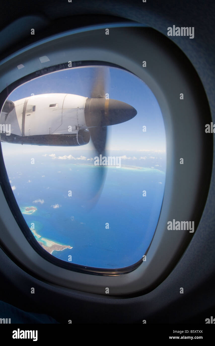 View from plane window over caribbean Stock Photo - Alamy