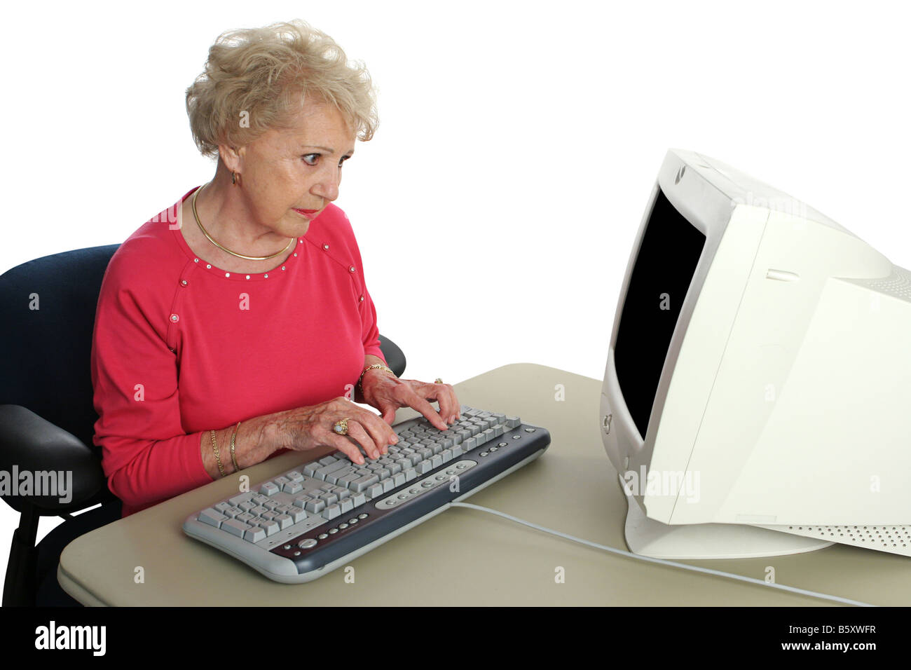 A senior lady confused by the computer Screen intentionally blank ready ...