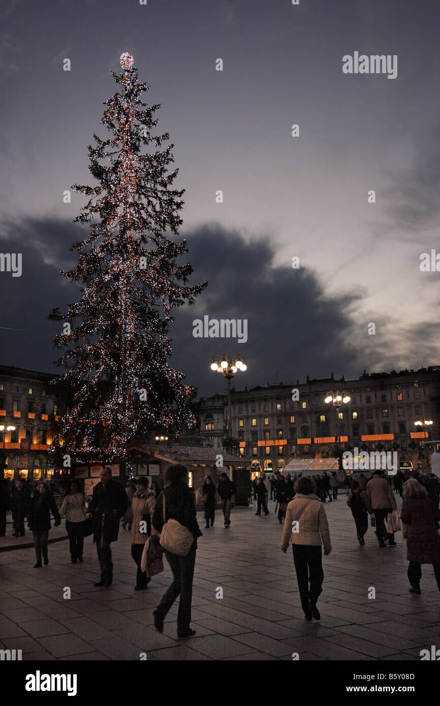 Lighting Christmas tree in Cathedral square with walking people Stock ...