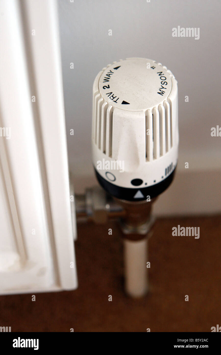 A manual thermostat control on a central heating radiator Stock Photo ...