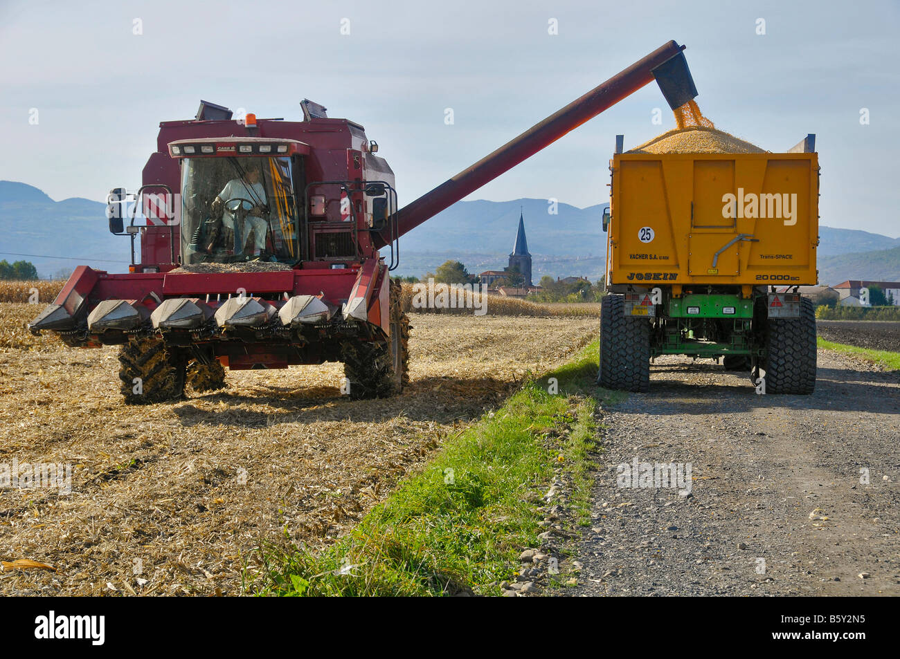 Combine harvester discharging grain hi-res stock photography and images ...