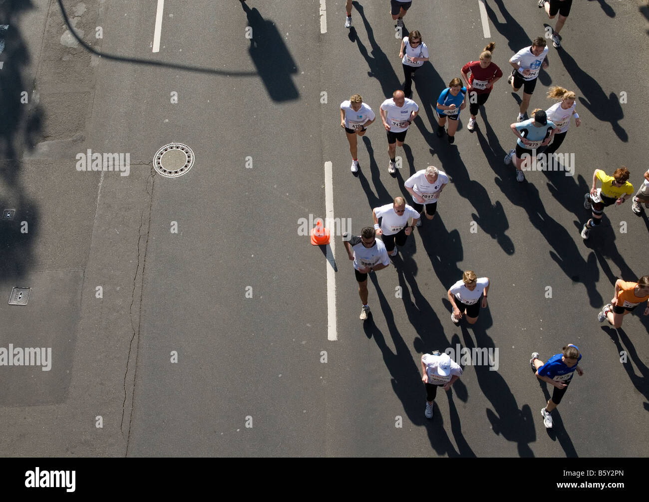 Marathon Runners seen from above Stock Photo - Alamy