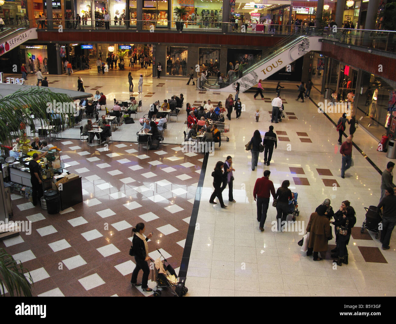 People walking in shopping mall, Marbella, Spain Stock Photo - Alamy