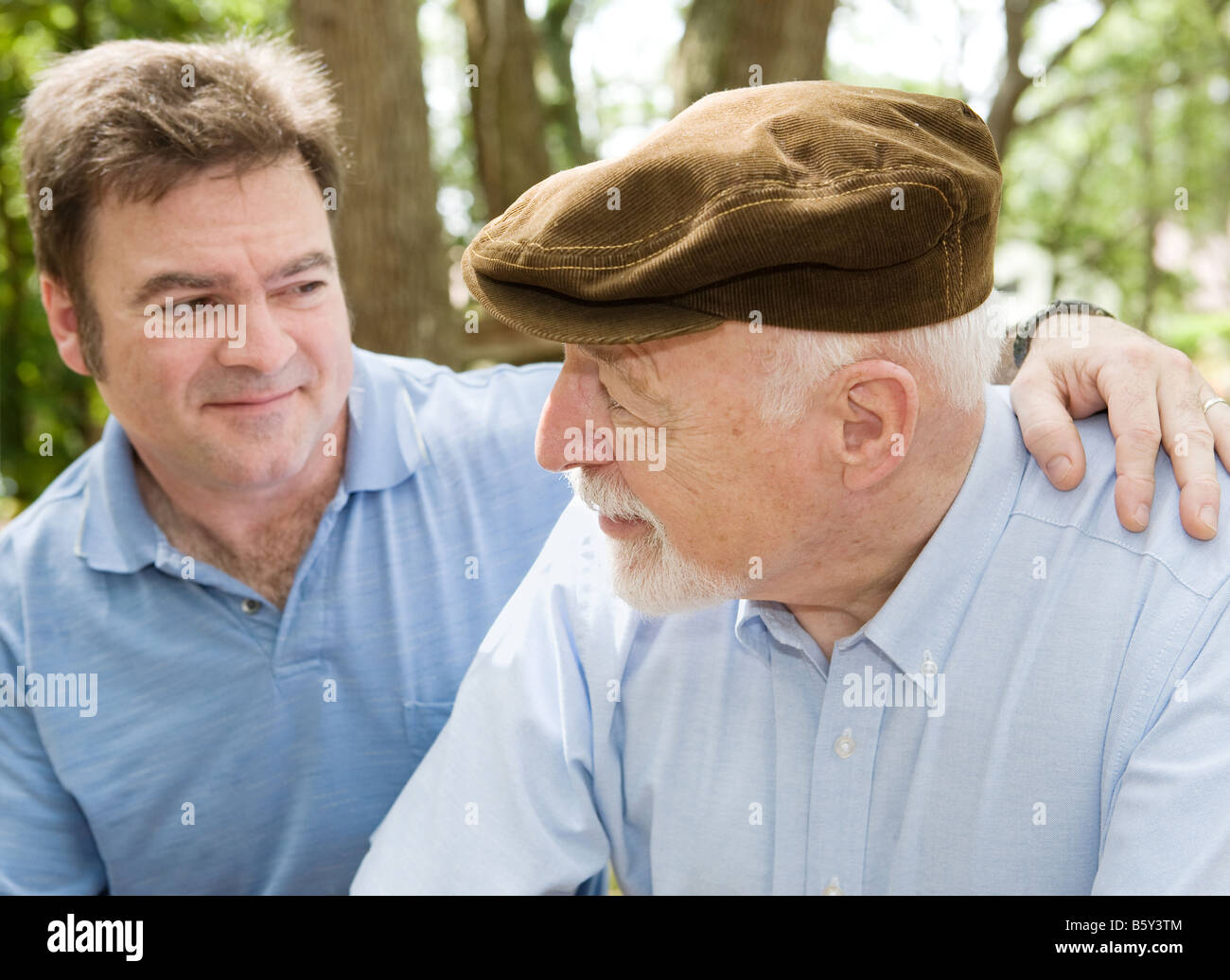 Senior father with his middle aged son Focus on the elderly man Stock ...