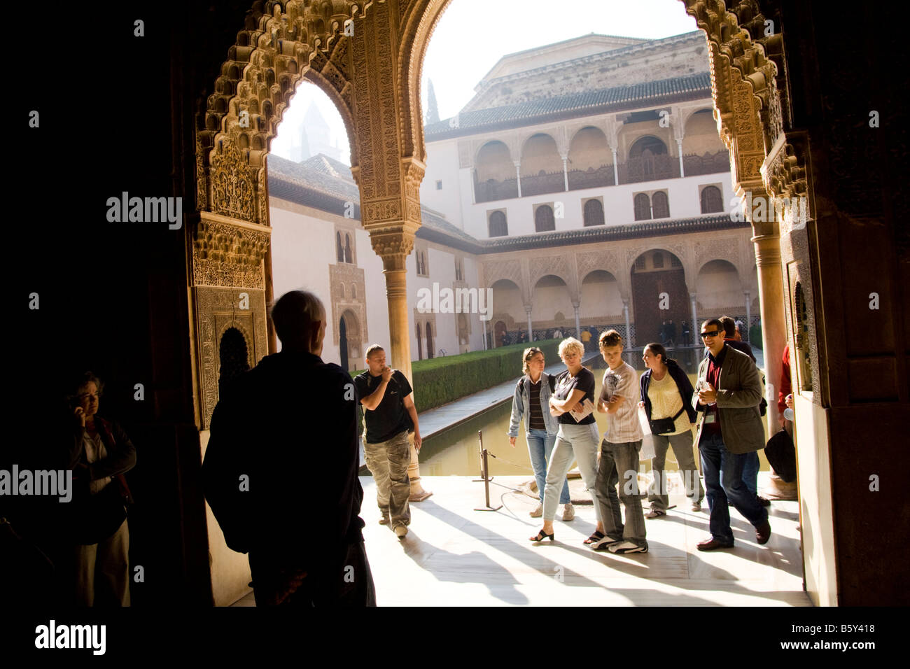 Group of tourists enter the Casa Real complex, La Alhambra, Granada, Andalusia, Spain Stock ...