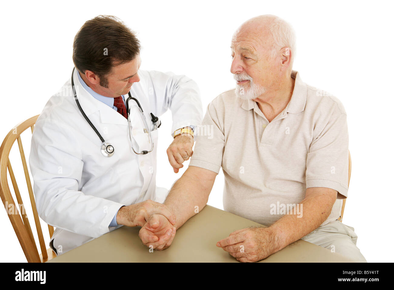 Doctor checking senior man s pulse White background Stock Photo - Alamy
