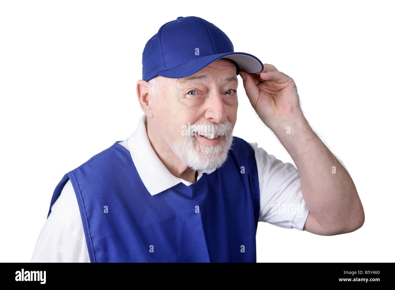 A senior man working as a greeter tips his hat to welcome you to the ...