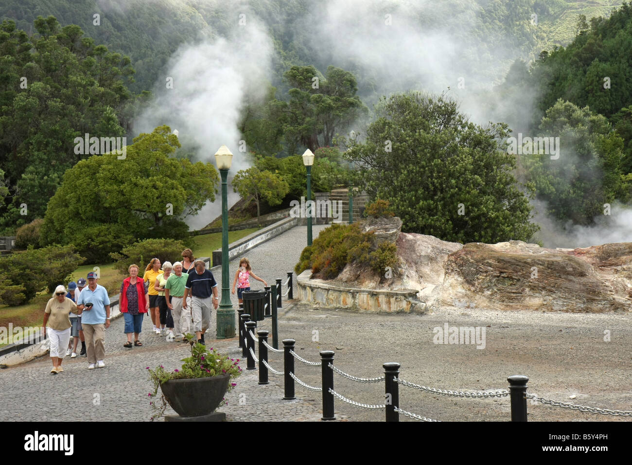 Tourists at the village of Furnas, São Miguel, Azores, Portugal. Fumes ...