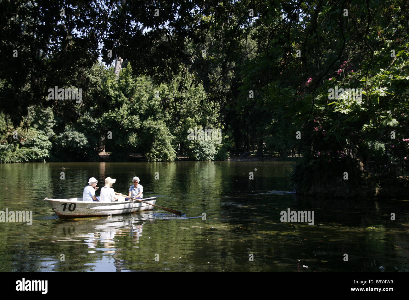 women in rowing boat on lake in villa borghese park in rome italy Stock ...