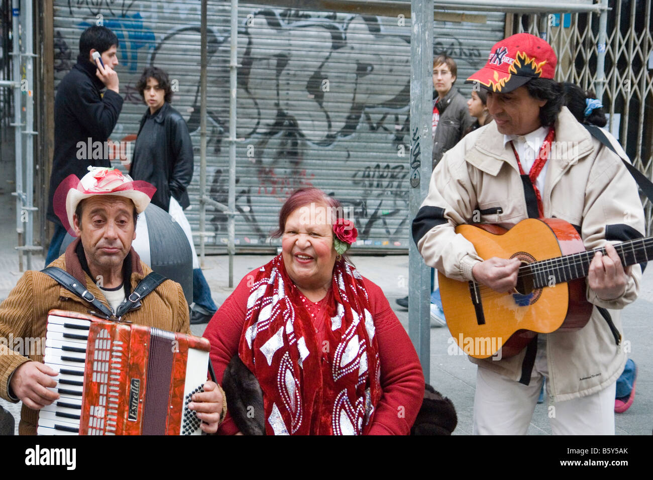 Gipsies performing at the Rastro market, in Madrid (Spain). Trio de ...