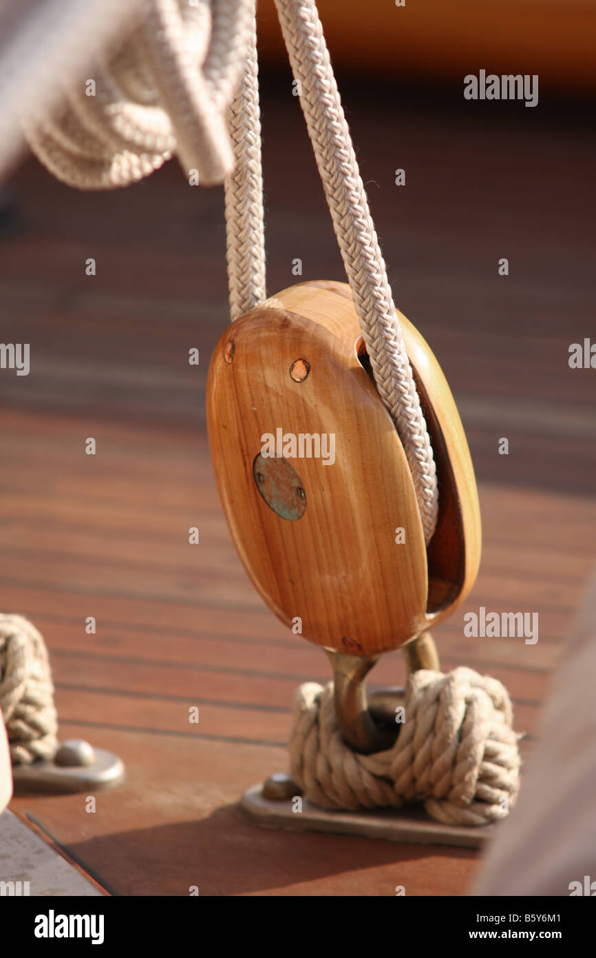 Wooden pulley in a ship Stock Photo - Alamy
