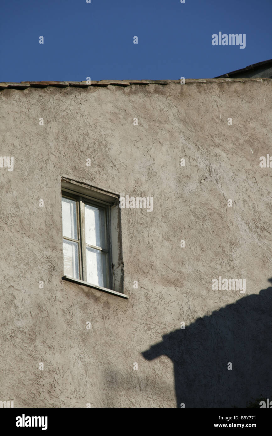one window on side wall of building Stock Photo - Alamy