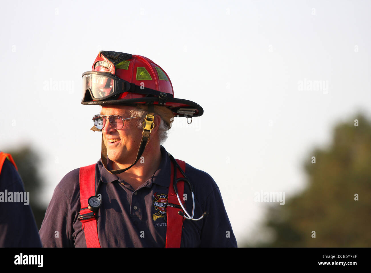 A fireman EMT on an emergency scene Stock Photo - Alamy